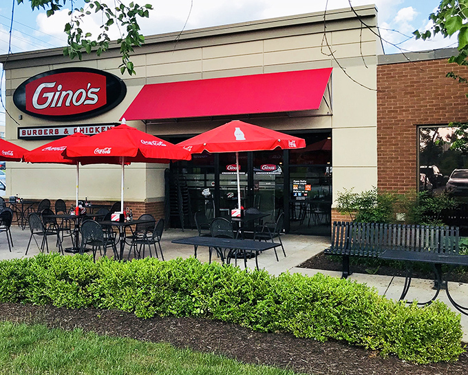 The beacon of burger bliss! Gino's bright red awning and outdoor seating area beckon hungry Marylanders like a culinary lighthouse on a sea of mediocre fast food.