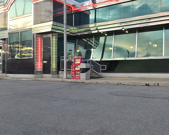 The Starlite Diner's exterior gleams like a mid-century time capsule, welcoming hungry travelers with its distinctive retro architecture and promise of comfort food classics.