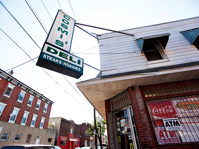 The iconic green and white sign beckons sandwich pilgrims like a hoagie lighthouse on South 8th Street. Philadelphia's sandwich history stands proudly on this corner.