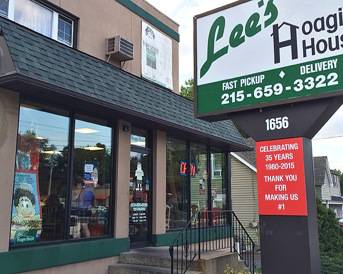The unassuming green-trimmed exterior of Lee's Hoagie House stands as a beacon to sandwich lovers. Behind that modest façade lies hoagie heaven waiting to be discovered.