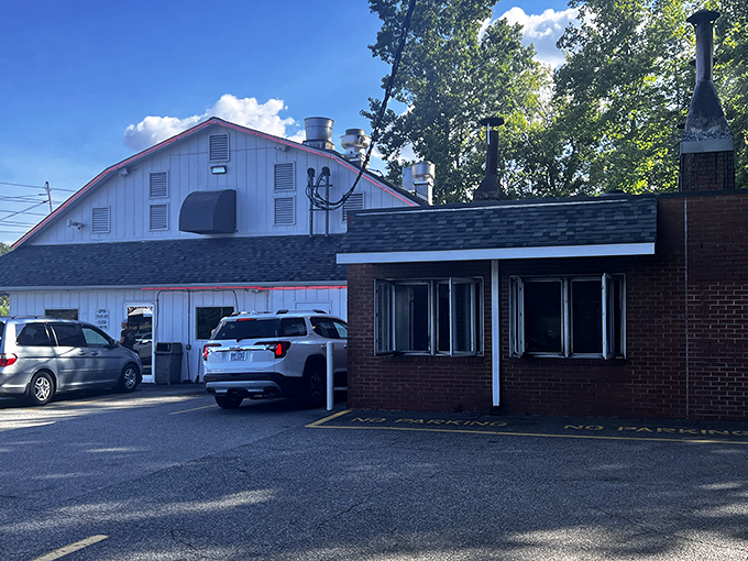 The unassuming white building holds barbecue greatness like a hidden treasure chest. Even the shadows wait in line at this pilgrimage-worthy destination.