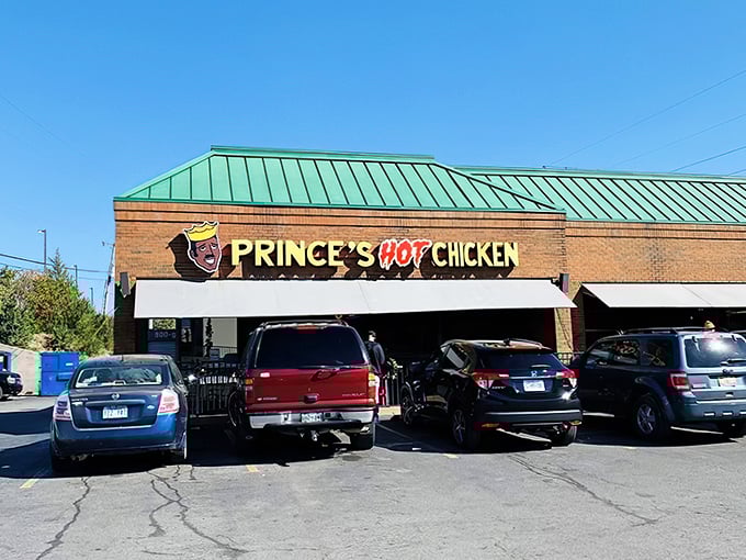 The brick-and-mortar temple of heat beckons with its iconic green roof. Nashville's spicy pilgrimage site has cars lined up like faithful worshippers.