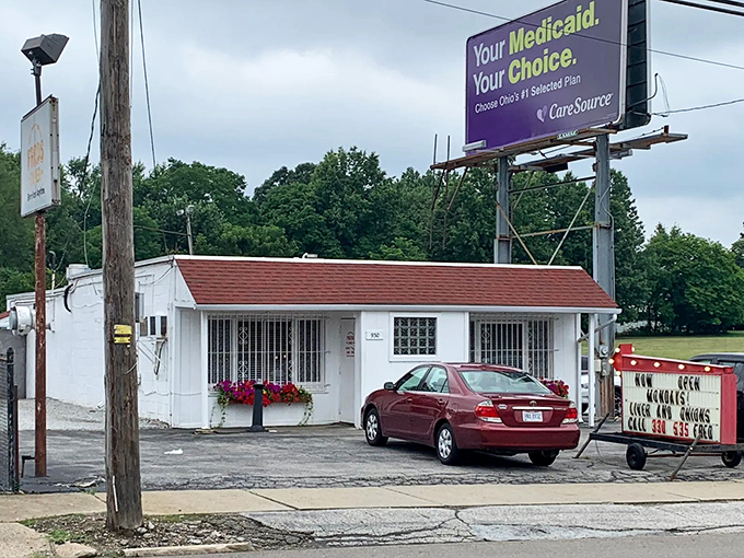 The unassuming white exterior of Fred's Diner proves once again that culinary treasures often hide in plain sight. No frills, just thrills await inside.