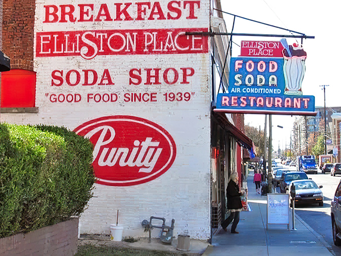 The iconic white brick building with its vintage "FOOD SODA" neon sign stands as Nashville's time machine to simpler days, complete with classic red and white awning.