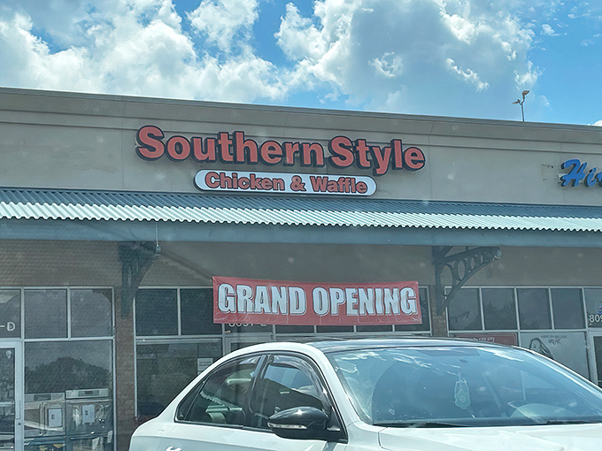 The bright red sign of Southern Style Chicken & Waffle stands out like a culinary lighthouse, promising comfort food salvation to hungry Springfield travelers.