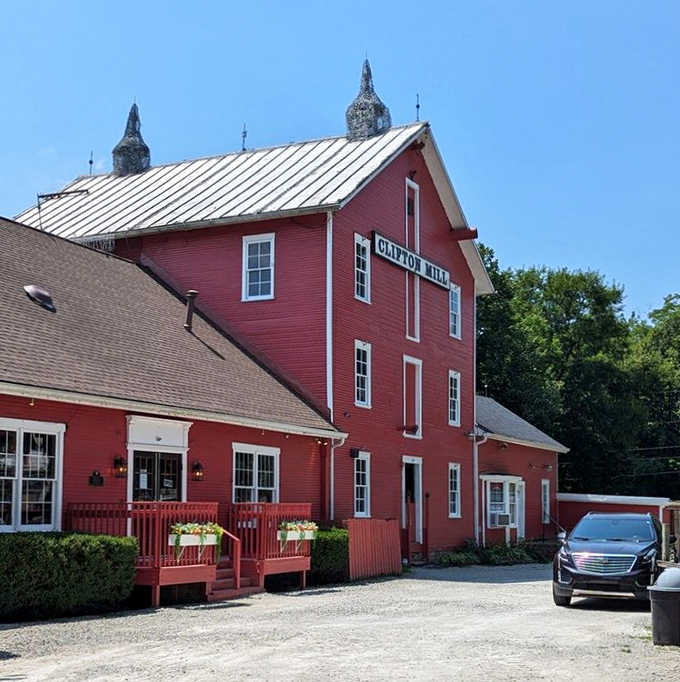 The iconic red mill perched above cascading waterfalls isn't just Instagram bait&mdash;it's a 200-year-old testament to when breakfast came with a side of history.
