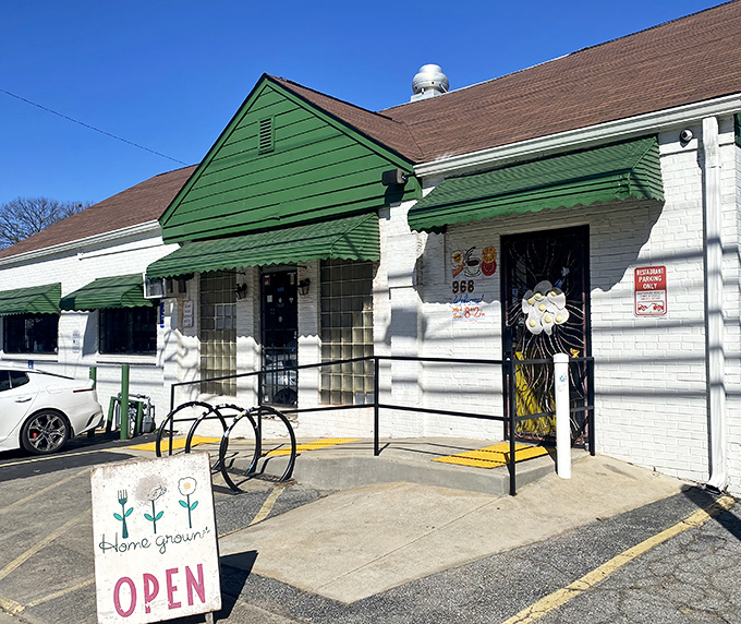 The green awnings and white brick exterior of Home grown GA beckon like an old friend saying, "Come on in, the biscuits are waiting."