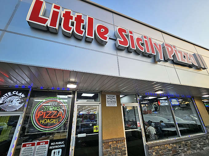 The bright red sign of Little Sicily Pizza 2 beckons like a lighthouse for the hungry. Philadelphia's culinary odd couple &ndash; Italian tradition meets Indian spice &ndash; hiding in plain sight.