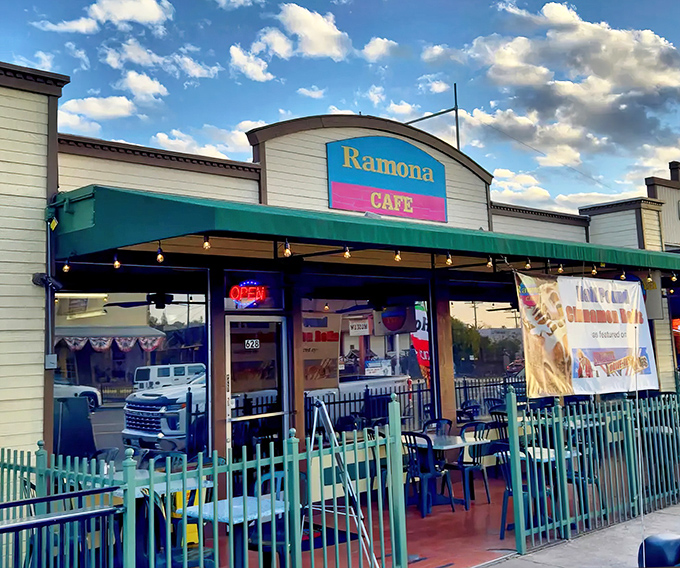 The holy grail of breakfast spots announces itself boldly. Ramona Cafe's banner proudly proclaims what pilgrims travel miles to experience: those legendary half-pound cinnamon rolls.