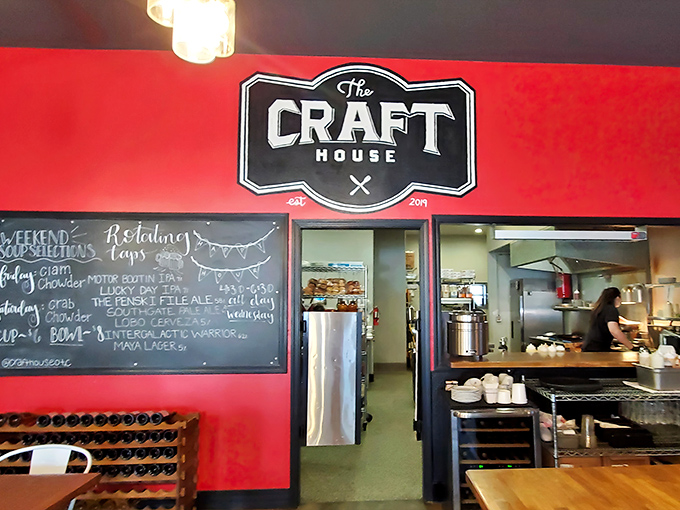 The Craft House's charming exterior beckons with its classic white siding and distinctive black signage&mdash;like a culinary lighthouse guiding hungry travelers home.