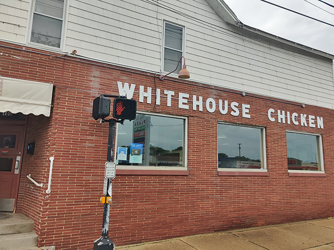 The unassuming brick exterior of White House Chicken holds no pretense &ndash; just the promise of Barberton's finest poultry legacy waiting inside that humble doorway.