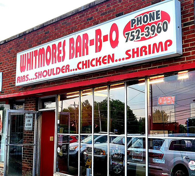 That red brick facade might look humble, but inside lies barbecue magic that'll change your life forever.