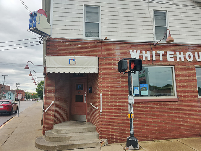 The unassuming brick exterior of White House Chicken in Barberton hides culinary greatness within. Like finding a Michelin star in your neighbor's garage.