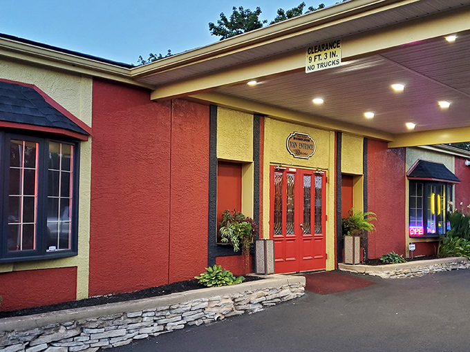 The vibrant red and yellow exterior of Taqueria Moroleon stands out like a tropical oasis in Pennsylvania, promising authentic flavors behind those welcoming doors.