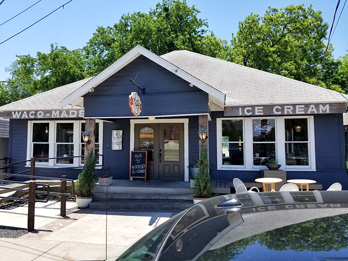 The charming navy-blue exterior of Heritage Creamery stands like a beacon of sweet salvation against Texas' summer heat.