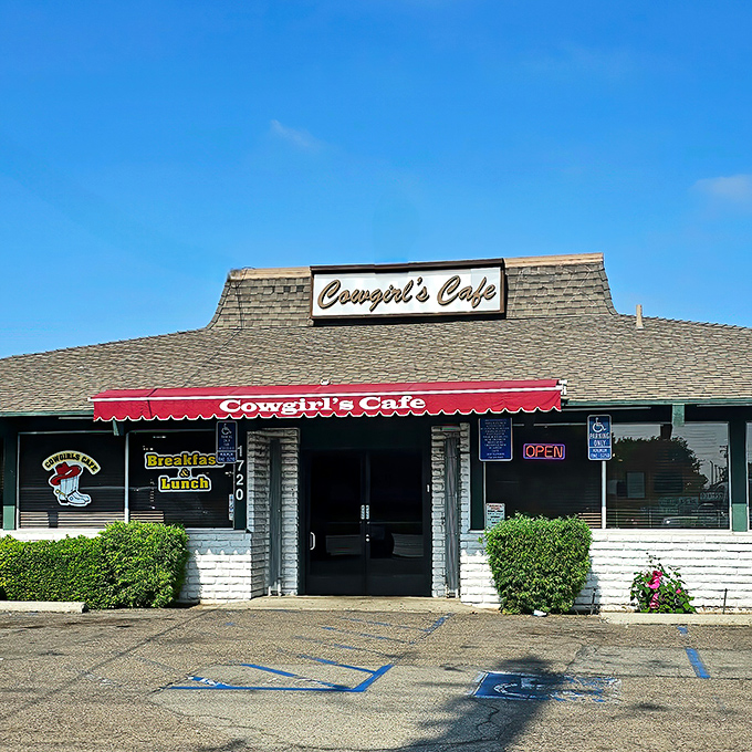The unassuming exterior of Cowgirls Cafe hides culinary treasures within. Like finding a diamond in a strip mall, this breakfast haven beckons hungry travelers.