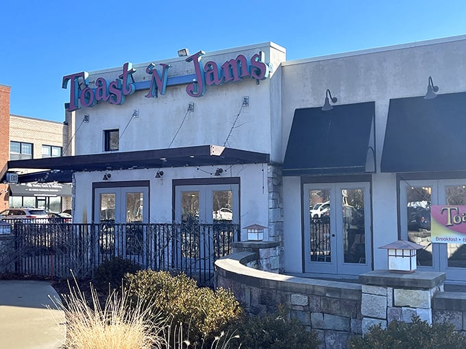 The welcoming stone patio at Toast 'N Jams beckons like an old friend. Morning sunshine optional, breakfast bliss guaranteed.