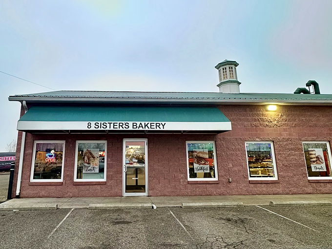 The pink building that houses 8 Sisters Bakery stands like a beacon of sweetness in Mt. Gilead, promising delicious treasures within.