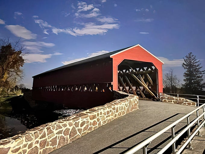 The crimson hue of Sachs Covered Bridge against Pennsylvania's greenery creates a postcard-perfect scene that no Instagram filter could improve upon.