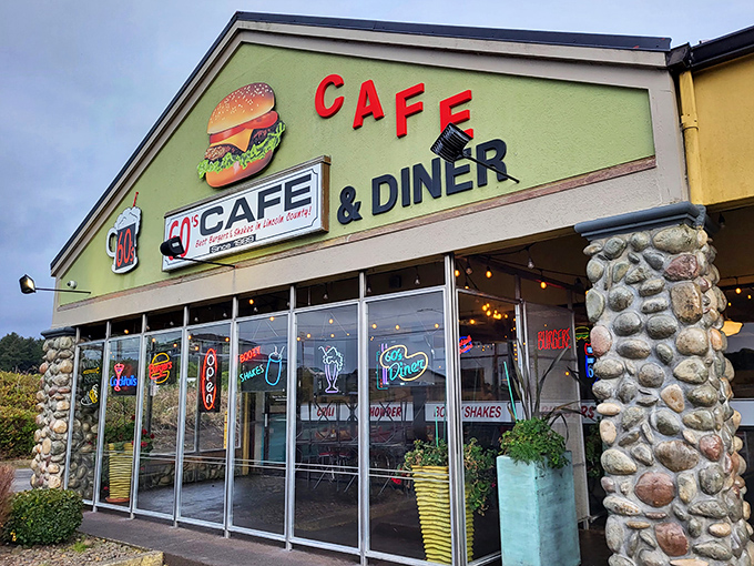The burger on the sign is practically winking at hungry travelers. This Lincoln City landmark promises a time-traveling culinary adventure right off Highway 101.