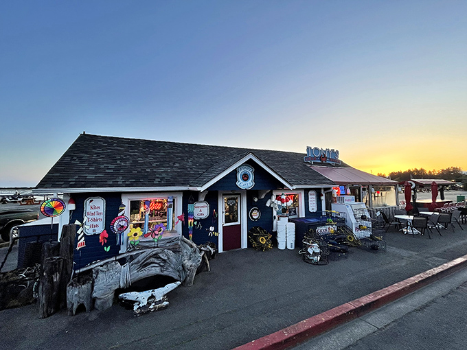 Sunset magic at Tony's Crab Shack, where the weathered blue exterior and quirky nautical decor hint at the seafood treasures waiting inside.