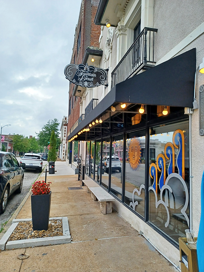 The stately Art Deco fa&ccedil;ade of The Fountain on Locust stands as a culinary beacon on St. Louis' historic Locust Street, promising retro delights within.