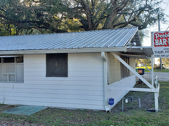 The unassuming exterior of Peebles Bar-B-Q proves once again that in the barbecue world, the most modest buildings often hide the most magnificent flavors.