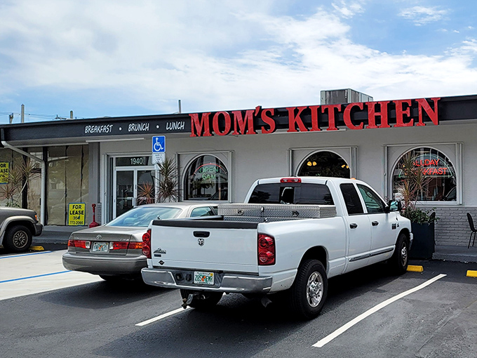 The iconic red lettering of Mom's Kitchen beckons like a lighthouse for the breakfast-starved. Come as a stranger, leave as family.