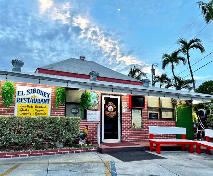 The unassuming brick exterior of El Siboney is like a culinary speakeasy—no flash, just the promise of authentic Cuban treasures waiting inside.