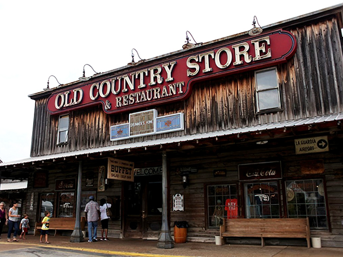 The weathered wooden exterior of Brooks Shaw's Old Country Store beckons like a time machine disguised as a restaurant. Southern comfort awaits inside! 
