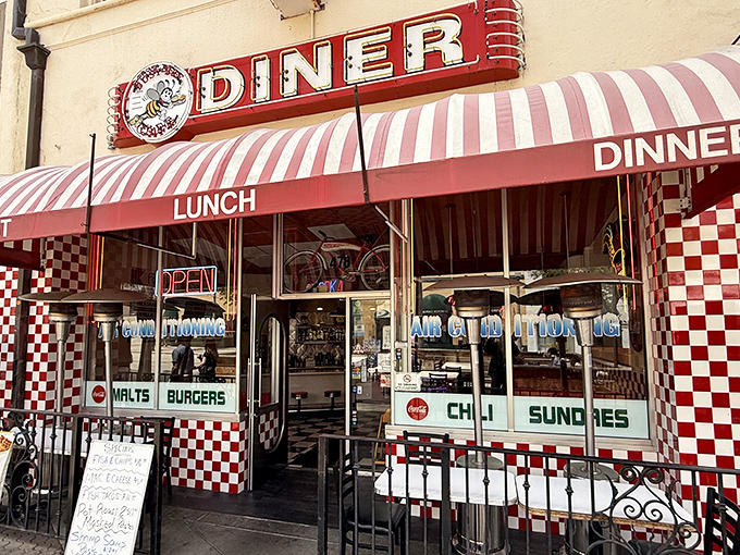 The classic red and white checkered exterior of Busy Bee Cafe isn't just inviting&mdash;it's practically shouting "Get in here and eat something wonderful!"