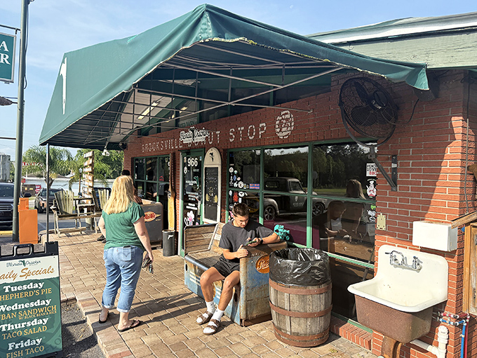 The brick facade of Florida Cracker Kitchen promises authentic Florida heritage before you even step inside. Real estate indeed—this is prime territory for comfort food enthusiasts.