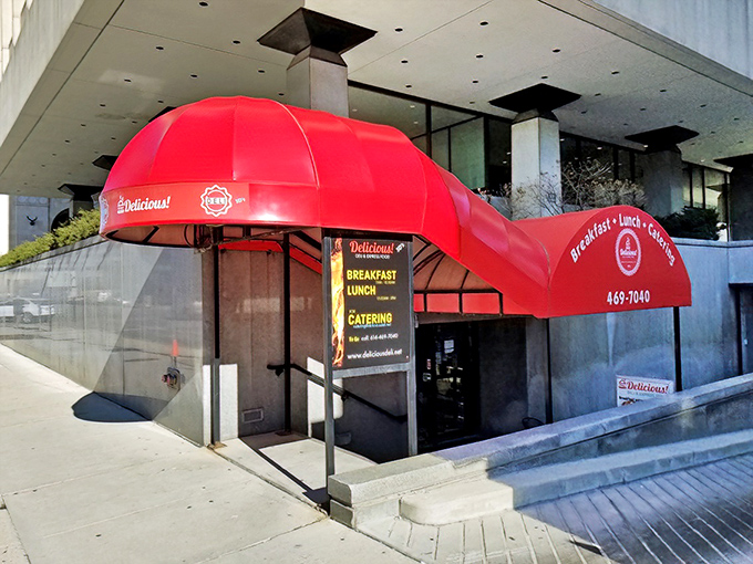 That iconic red umbrella entrance isn't just eye-catching&mdash;it's a beacon of sandwich salvation for downtown Columbus lunch-seekers.