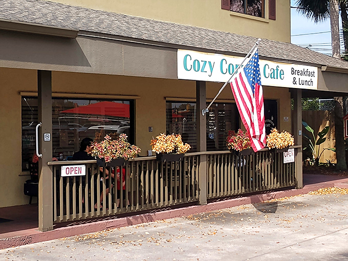 The yellow facade of Cozy Corner Cafe stands like a beacon of breakfast hope in Merritt Island's Court House Square, promising comfort food and conversation.