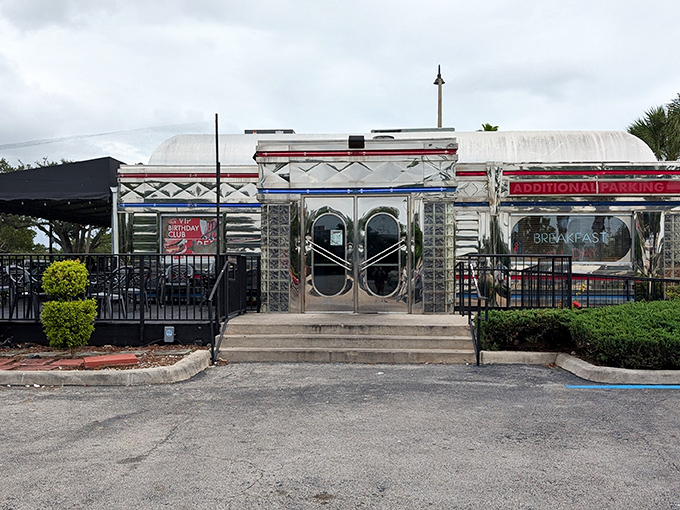 Chrome gleaming in the Florida sunshine, Moonlite Diner's exterior promises a time-traveling feast. This isn't just a restaurant&mdash;it's a shiny portal to simpler times. 