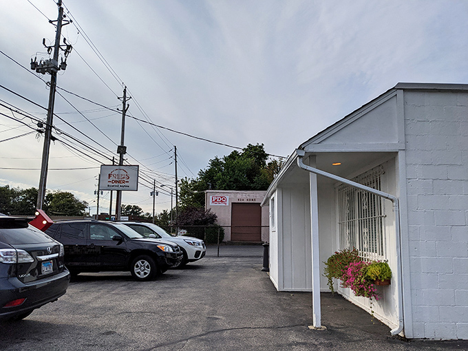 The unassuming white exterior of Fred's Diner proves once again that culinary treasures often hide in plain sight. No frills, just thrills await inside.