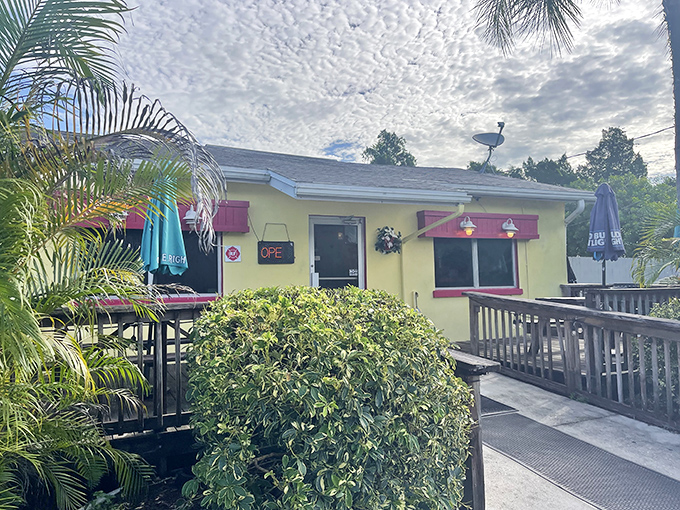 The cheerful yellow exterior with red shutters beckons like a breakfast lighthouse in Alva. Palm trees and a welcoming ramp complete this unassuming culinary gem.