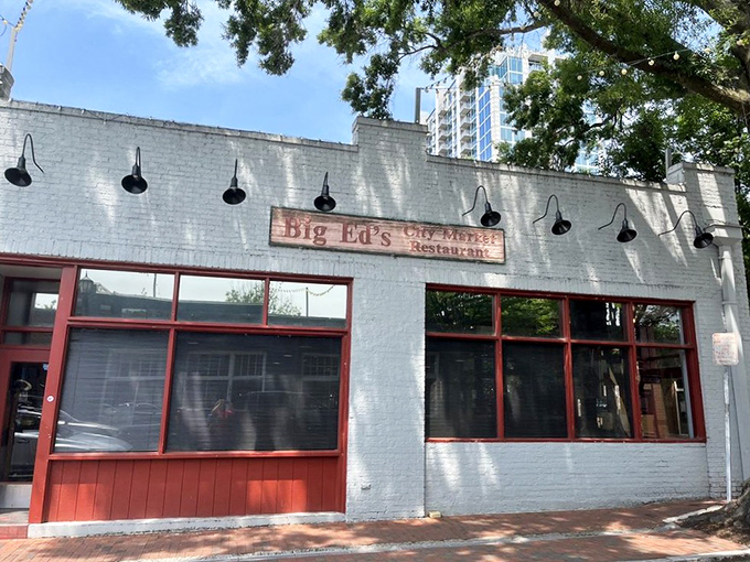 The unassuming white brick exterior of Big Ed's hides a Southern food paradise within, like finding a treasure chest disguised as a regular old box.