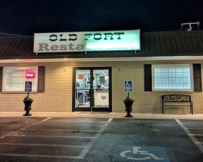 The unassuming exterior of Old Fort Restaurant glows like a beacon for hungry travelers. No fancy frills, just the promise of honest-to-goodness Southern cooking inside.