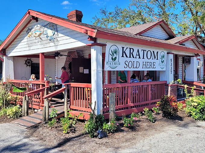 Old Florida charm doesn't get more authentic than this red-trimmed cracker house. The neon "OPEN" sign might as well say "Seafood Paradise Found."