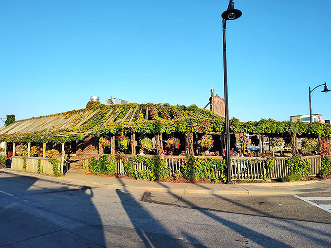 Mother Nature's favorite restaurant? This vine-covered waterfront gem looks like it was decorated by the world's most talented gardener.
