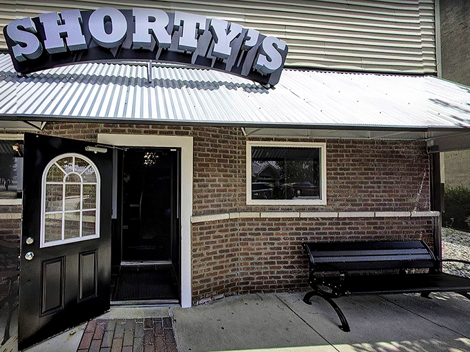 The unassuming brick exterior of Shorty's Steakhouse proves once again that the best culinary treasures often hide behind the most modest facades.