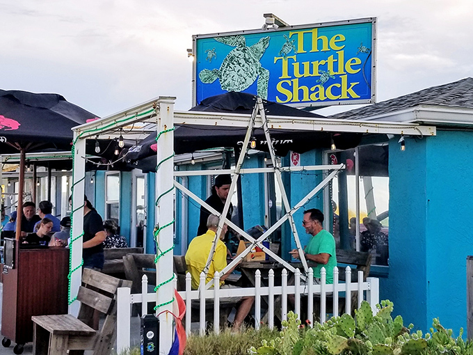 The turquoise beacon of seafood salvation! The Turtle Shack's vibrant exterior promises Florida coastal dining at its most authentic and unpretentious.