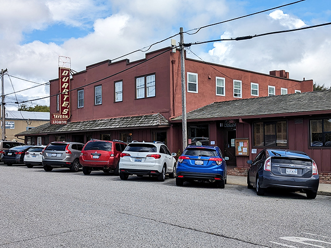 That vintage neon sign isn't just decoration &ndash; it's a beacon calling hungry travelers to chowder paradise.