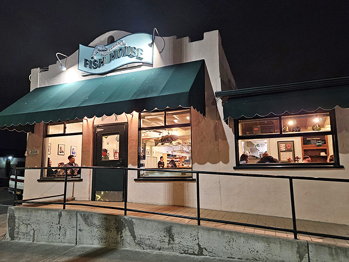 The unassuming pink exterior with green awnings might fool you, but locals know&mdash;culinary treasures often hide in plain sight.