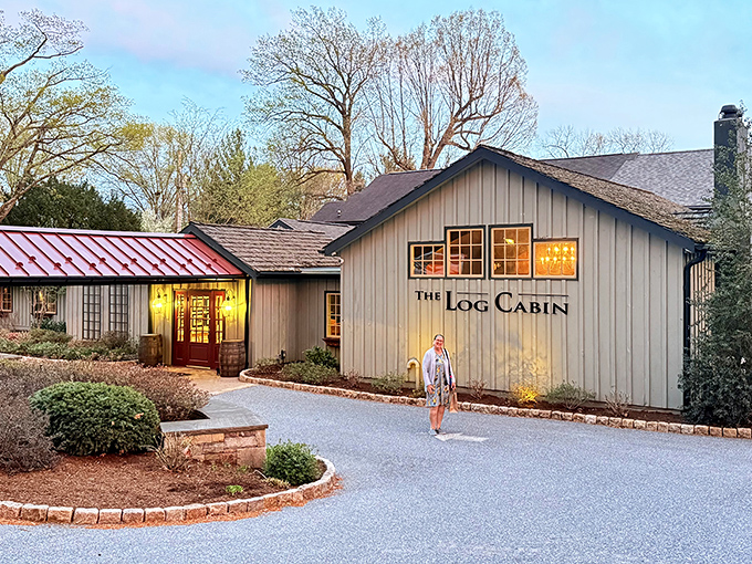 The Log Cabin's exterior blends seamlessly with its woodland surroundings, like a storybook restaurant that materialized from your fondest dining fantasies.