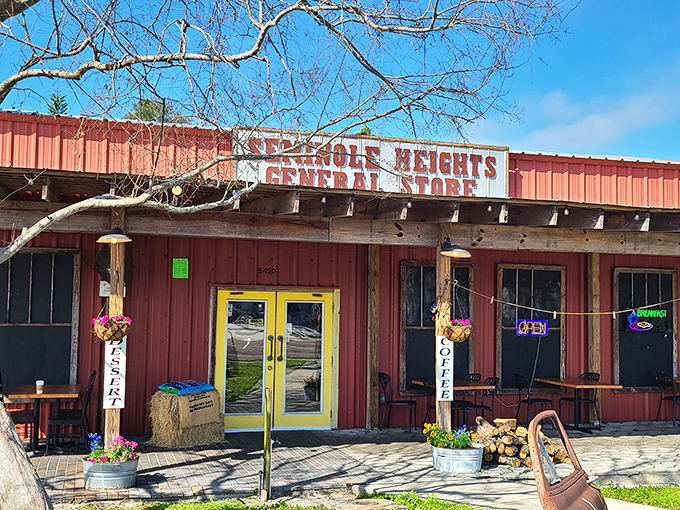 That rustic red exterior with sunny yellow doors isn't just Florida charm&mdash;it's your signal that sandwich nirvana awaits inside.