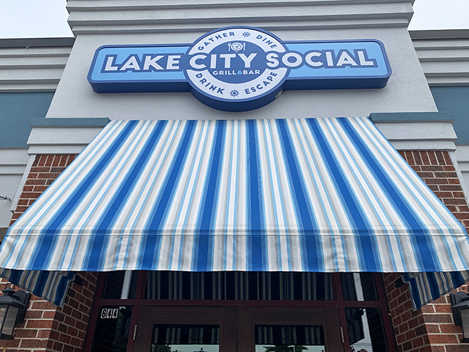 Blue skies and blue awnings welcome you to Lake City Social, where flower boxes burst with color like Wisconsin summer itself.