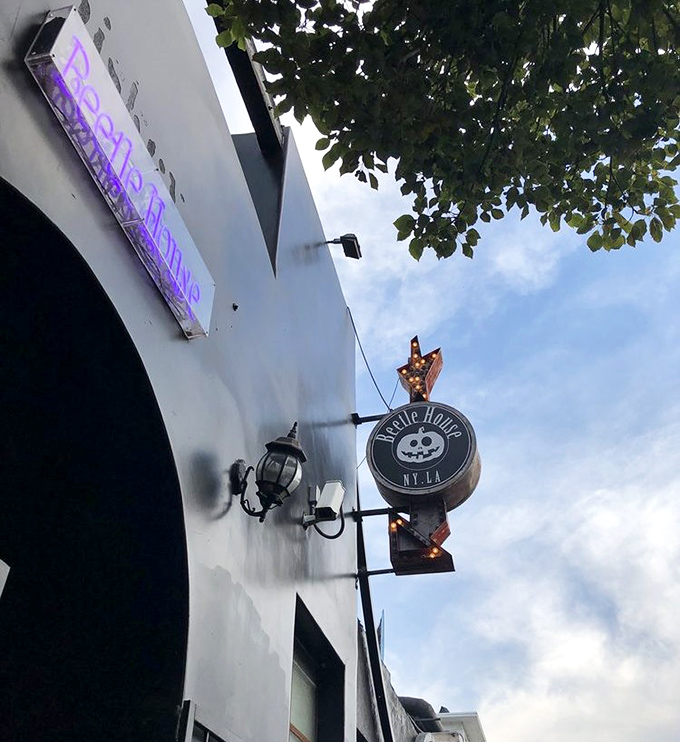 Gothic grandeur meets Hollywood glamour at this ornate entrance that promises theatrical dining adventures. 