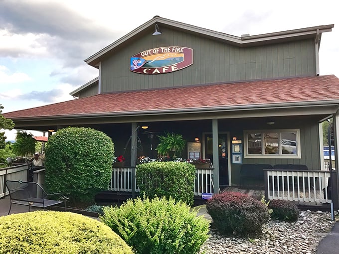 The sage-green exterior of Out of the Fire Cafe stands like a culinary lighthouse in Donegal, beckoning hungry travelers with promises of extraordinary flavors within.